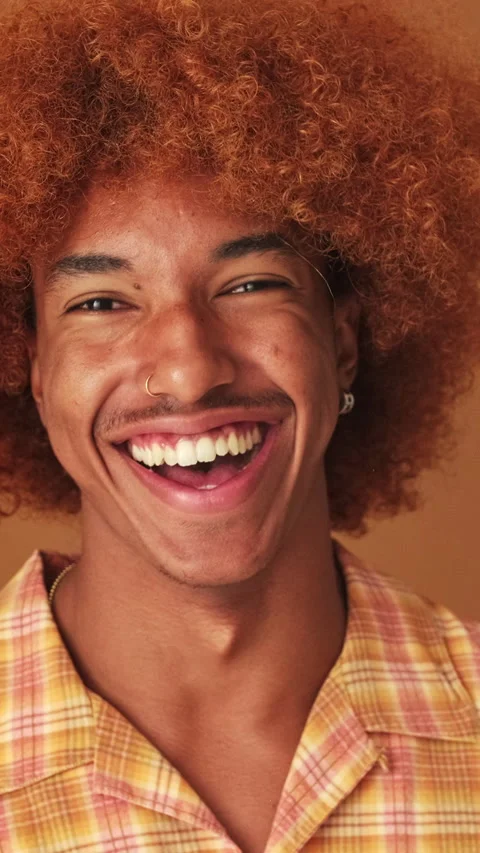 Close up, guy laughing looking at the ca... | Stock Video | Pond5