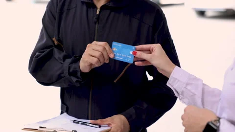 Handing Credit Card Stock Footage ~ Royalty Free Stock Videos | Pond5
