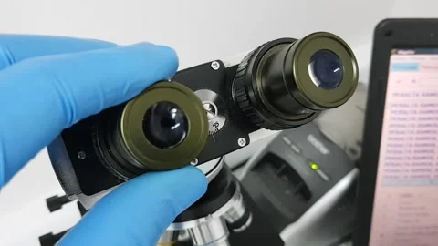 Close up of hand on diopter adjustment o... | Stock Video | Pond5