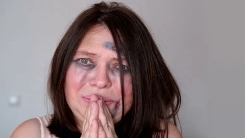 close-up of hand at female tear-stained ... | Stock Video | Pond5