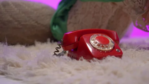 Close-Up of Hand Reaching for Red Rotary... | Stock Video | Pond5