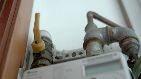Close-up of hand turning gas meter down.... | Stock Video | Pond5