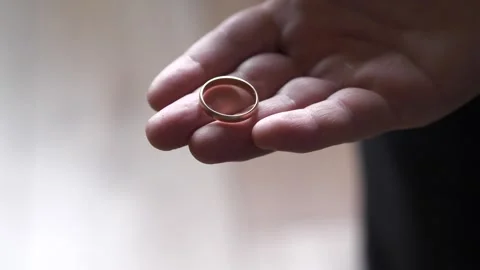 close up on hand with wedding ring fall ... | Stock Video | Pond5