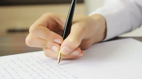 Close-up of hand writing a letter | Stock Video | Pond5