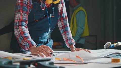 Close up hands of builder man drawing, w... | Stock Video | Pond5