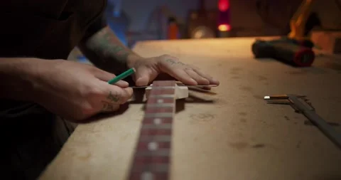 Close up of hands making marks using rul... | Stock Video | Pond5