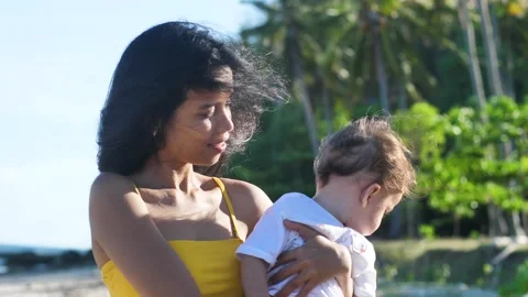Close up of happy young Filipino mother ... | Stock Video | Pond5