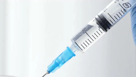Close Up of injection liquid being in sy... | Stock Video | Pond5