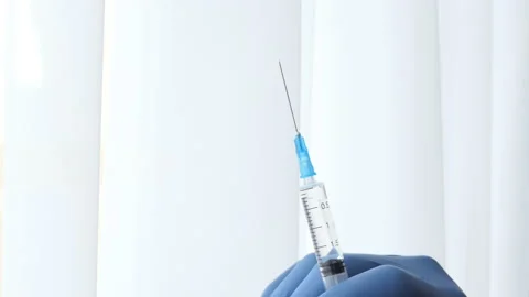 Close Up of injection liquid being in sy... | Stock Video | Pond5