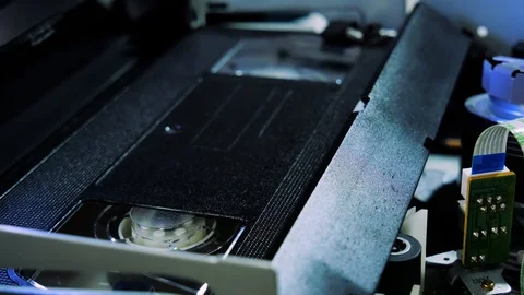 Close-up inside on a VHS video recorder ... | Stock Video | Pond5