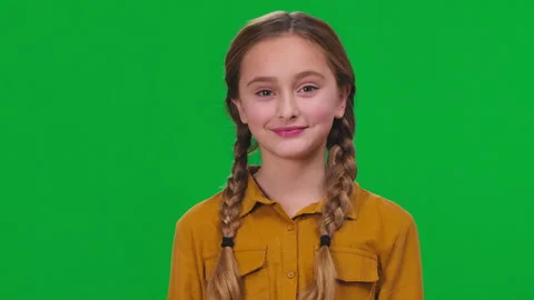 Close-up joyful girl turning on green sc... | Stock Video | Pond5