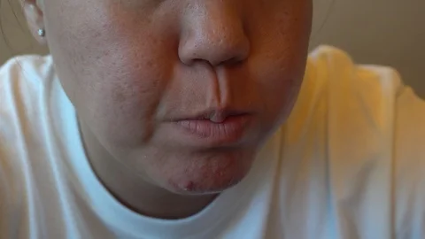 Woman Swallowing Stock Videos – Royalty-Free HD & 4K Videos