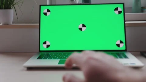 Close-up of laptop screen with green bac... | Stock Video | Pond5