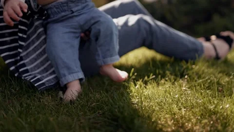Close up of the legs of a little baby bo... | Stock Video | Pond5
