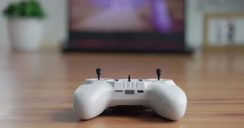 Close-up lies on the table joystick to c... | Stock Video | Pond5