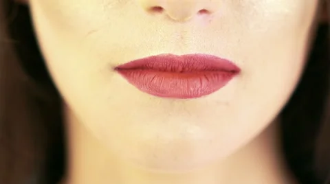 Close up of lips making kissing faces. S... | Stock Video | Pond5