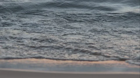 Close up of little wave on a beach | Stock Video | Pond5
