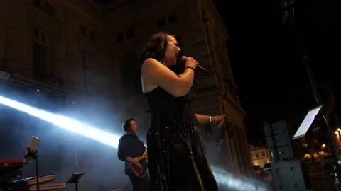 Close-up low shot of a female lead singe... | Stock Video | Pond5