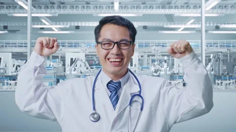 Close Up Of Male Doctor Smile And Flex M... | Stock Video | Pond5