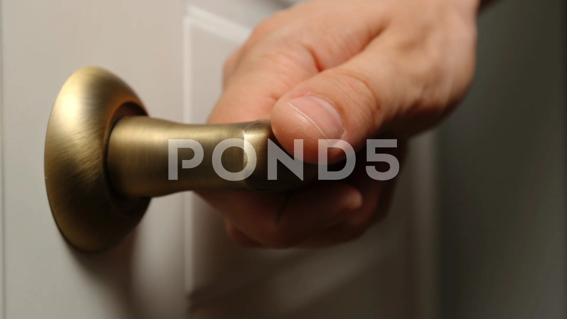 Mans Hand Opening Door