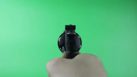 Close-Up Of Male Hand pointing Revolver... | Stock Video | Pond5