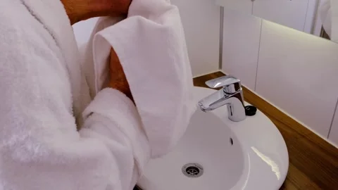 close-up male hand in toilet room wipe c... | Stock Video | Pond5