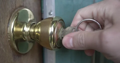 Close-Up Of Male Hands Turning The Key T... | Stock Video | Pond5