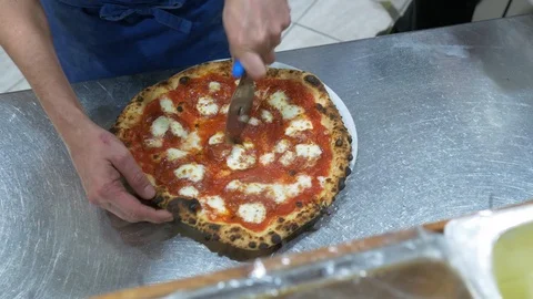 Close Up of male Pizza Maker hands cutti... | Stock Video | Pond5