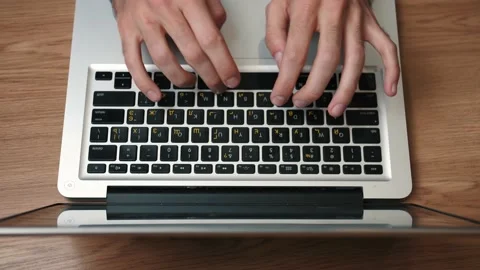 Close up man hands typing on laptop keyb... | Stock Video | Pond5
