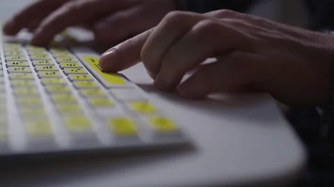 Close-up: A man uses a keyboard with bra... | Stock Video | Pond5