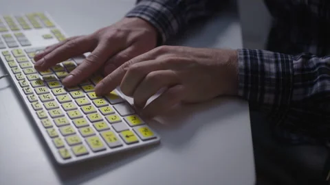 Close-up: A man uses a keyboard with bra... | Stock Video | Pond5