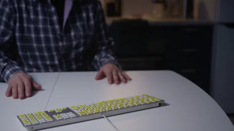 Close-up: A man uses a keyboard with bra... | Stock Video | Pond5