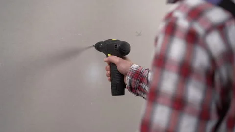 Close-up man's hand install drywall with... | Stock Video | Pond5