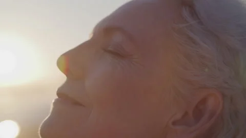 Close up of Mature Woman at Sunset | Stock Video | Pond5
