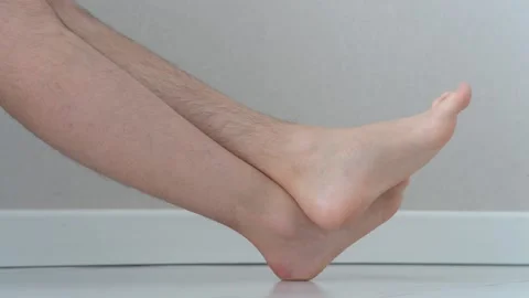 Close-up of men's feet barefoot on a til... | Stock Video | Pond5