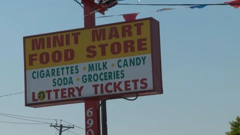 Close up of Mini Mart signage, day. | Stock Video | Pond5