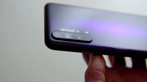 Close up of a mobile phone camera, flash... | Stock Video | Pond5