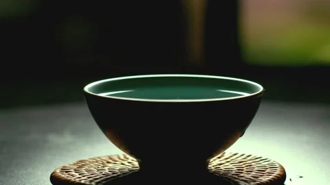 Close-up of the mood of tea cup water dr... | Stock Video | Pond5