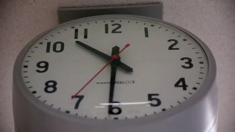 Close-up of mounted analog clock hanging... | Stock Video | Pond5