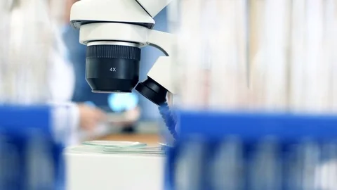 Close up of moving microscope in laborat... | Stock Video | Pond5