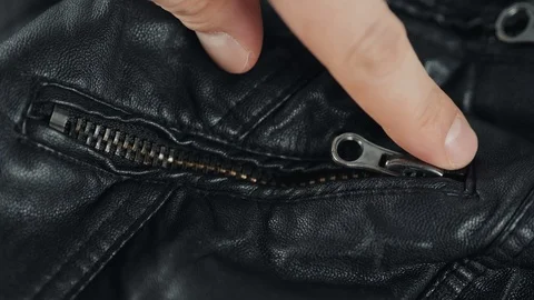 close up Opened zipper on man leather ja... | Stock Video | Pond5