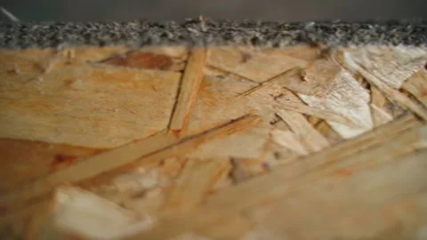 Close-up of oriented strand board. The m... | Stock Video | Pond5