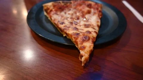 Close up over the top view of a slice of... | Stock Video | Pond5