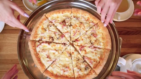 Close up of people hands taking slices p... | Stock Video | Pond5