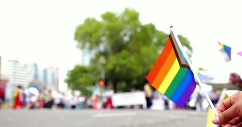 Close up to people waving a few LGBTIQA+... | Stock Video | Pond5