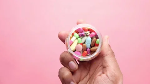 Close up of person hand holding pill con... | Stock Video | Pond5