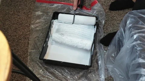 Close up of a person rolling a paint rol... | Stock Video | Pond5