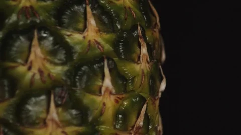 Close up of pineapple scale skin rotatin... | Stock Video | Pond5