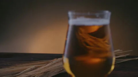 close-up of a pint of beer, an amber dri... | Stock Video | Pond5