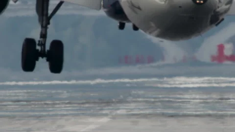 Close-up of Plane Making Uneven Landing ... | Stock Video | Pond5